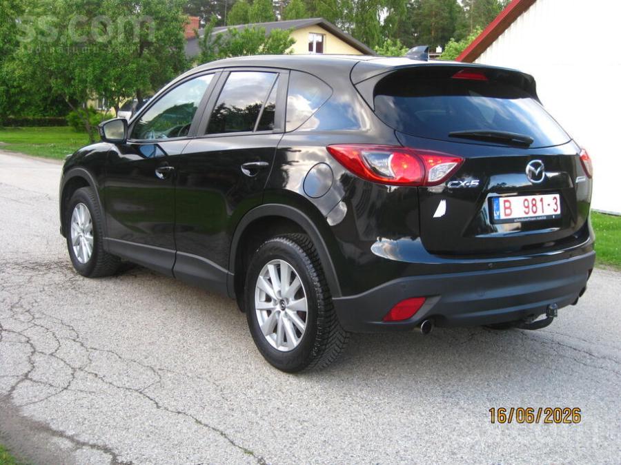 Black Mazda CX-5 2012 in Jekabpils, with an engine capacity of 2.20 L and mileage of 233 thousand km for 6499 €, photo 8 on AUTOMOTO.COM.LV