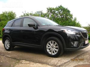 Black Mazda CX-5 2012 in Jekabpils, with an engine capacity of 2.20 L and mileage of 233 thousand km for 6499 €, photo 11 on AUTOMOTO.COM.LV