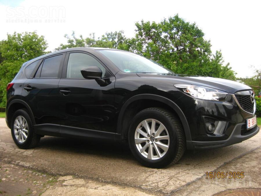Black Mazda CX-5 2012 in Jekabpils, with an engine capacity of 2.20 L and mileage of 233 thousand km for 6499 €, photo 11 on AUTOMOTO.COM.LV