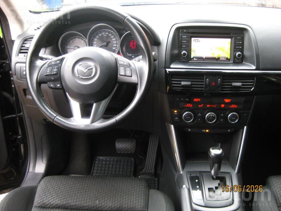 Black Mazda CX-5 2012 in Jekabpils, with an engine capacity of 2.20 L and mileage of 233 thousand km for 6499 €, photo 12 on AUTOMOTO.COM.LV