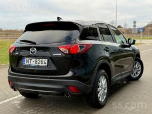 Melns Mazda CX-5 2013 Rēzekne, ar dzinēja tilpumu 2.20 L un nobraukumu 172 tūkst. km par 6590 €, foto 5 vietnē AUTOMOTO.COM.LV