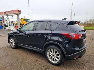 Black Mazda CX-5 2013 in Taurage, with an engine capacity of 2.20 L and mileage of 283 thousand km for 5150 €, photo 3 on AUTOMOTO.COM.LV
