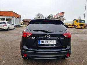 Black Mazda CX-5 2013 in Taurage, with an engine capacity of 2.20 L and mileage of 283 thousand km for 5150 €, photo 5 on AUTOMOTO.COM.LV