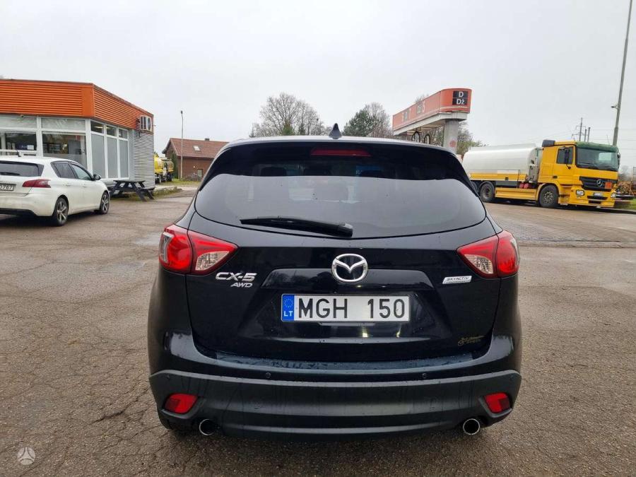 Black Mazda CX-5 2013 in Taurage, with an engine capacity of 2.20 L and mileage of 283 thousand km for 5150 €, photo 5 on AUTOMOTO.COM.LV