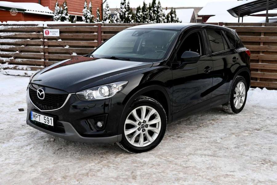Black Mazda CX-5 2013 in Kretinga, with an engine capacity of 2.19 L and mileage of 253 thousand km for 7499 €, photo 1 on AUTOMOTO.COM.LV