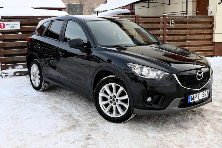 Black Mazda CX-5 2013 in Kretinga, with an engine capacity of 2.19 L and mileage of 253 thousand km for 7499 €, photo 3 on AUTOMOTO.COM.LV