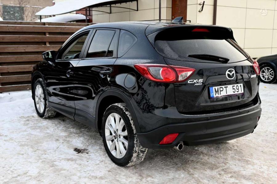 Black Mazda CX-5 2013 in Kretinga, with an engine capacity of 2.19 L and mileage of 253 thousand km for 7499 €, photo 6 on AUTOMOTO.COM.LV