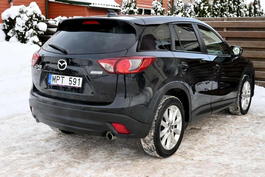 Black Mazda CX-5 2013 in Kretinga, with an engine capacity of 2.19 L and mileage of 253 thousand km for 7499 €, photo 8 on AUTOMOTO.COM.LV