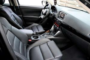 Black Mazda CX-5 2013 in Kretinga, with an engine capacity of 2.19 L and mileage of 253 thousand km for 7499 €, photo 22 on AUTOMOTO.COM.LV