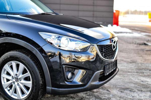 Black Mazda CX-5 2013 in Kretinga, with an engine capacity of 2.20 L and mileage of 193 thousand km for 7950 €, photo 5 on AUTOMOTO.COM.LV