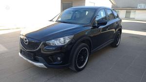 Black Mazda CX-5 2013 in Vilnius, with an engine capacity of 2.19 L and mileage of 215 thousand km for 7800 €, photo  on AUTOMOTO.COM.LV