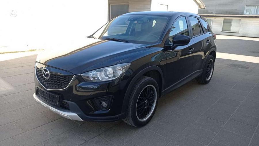 Black Mazda CX-5 2013 in Vilnius, with an engine capacity of 2.19 L and mileage of 215 thousand km for 7800 €, photo 1 on AUTOMOTO.COM.LV