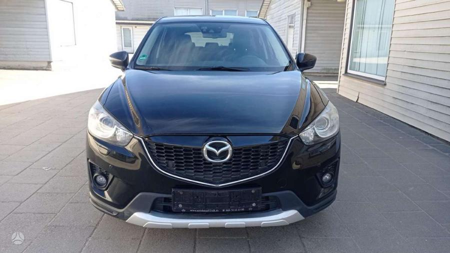 Black Mazda CX-5 2013 in Vilnius, with an engine capacity of 2.19 L and mileage of 215 thousand km for 7800 €, photo 2 on AUTOMOTO.COM.LV
