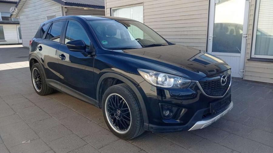 Black Mazda CX-5 2013 in Vilnius, with an engine capacity of 2.19 L and mileage of 215 thousand km for 7800 €, photo 3 on AUTOMOTO.COM.LV