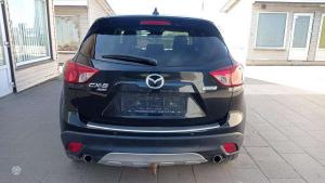 Black Mazda CX-5 2013 in Vilnius, with an engine capacity of 2.19 L and mileage of 215 thousand km for 7800 €, photo 5 on AUTOMOTO.COM.LV