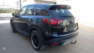 Black Mazda CX-5 2013 in Vilnius, with an engine capacity of 2.19 L and mileage of 215 thousand km for 7800 €, photo 6 on AUTOMOTO.COM.LV