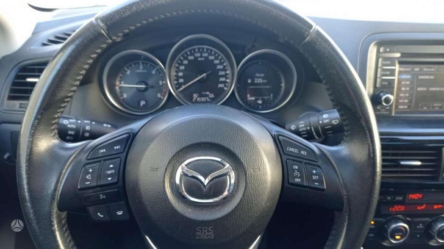 Black Mazda CX-5 2013 in Vilnius, with an engine capacity of 2.19 L and mileage of 215 thousand km for 7800 €, photo 14 on AUTOMOTO.COM.LV