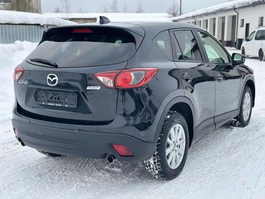 Black Mazda CX-5 2013 in Telschi, with an engine capacity of 2.19 L and mileage of 203 thousand km for 7800 €, photo 7 on AUTOMOTO.COM.LV