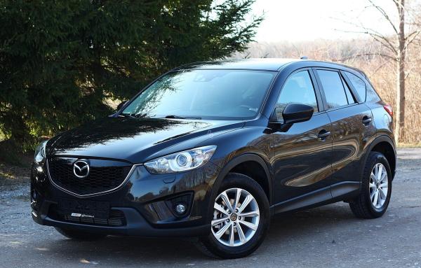 Black Mazda CX-5 2013 in Petrikaiciai, with an engine capacity of 2.20 L and mileage of 188 thousand km for 6699 €, photo 1 on AUTOMOTO.COM.LV