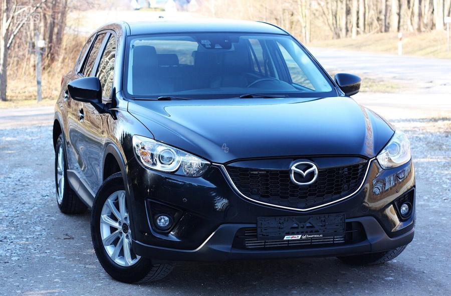 Melns Mazda CX-5 2013 Petrikaičiai, ar dzinēja tilpumu 2.20 L un nobraukumu 188 tūkst. km par 6699 €, foto 6 vietnē AUTOMOTO.COM.LV
