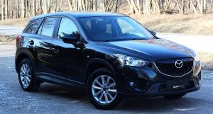 Melns Mazda CX-5 2013 Petrikaičiai, ar dzinēja tilpumu 2.20 L un nobraukumu 188 tūkst. km par 6699 €, foto 7 vietnē AUTOMOTO.COM.LV
