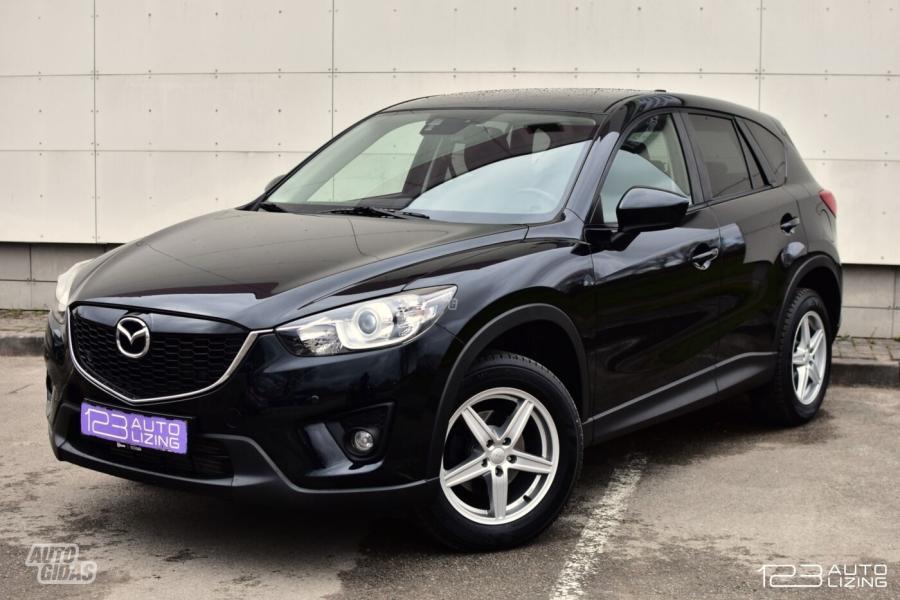 Black Mazda CX-5 2013 in Kretinga, with an engine capacity of 2.20 L and mileage of 196 thousand km for 7950 €, photo 1 on AUTOMOTO.COM.LV