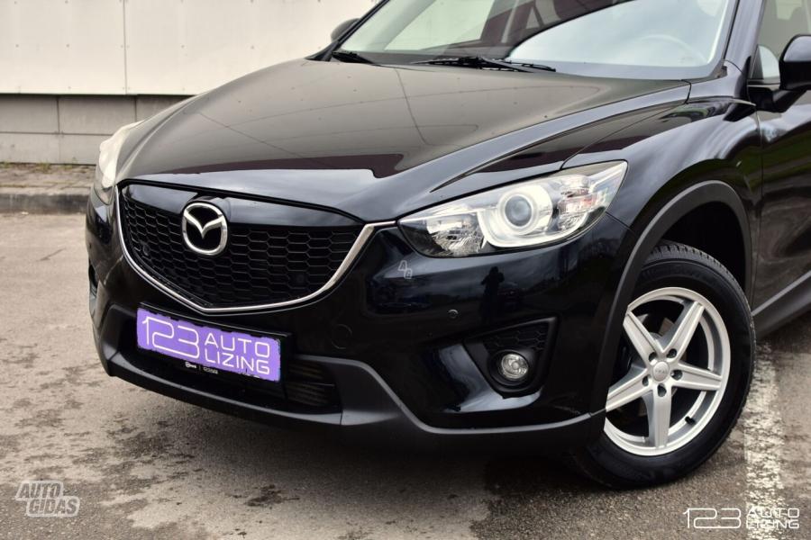 Black Mazda CX-5 2013 in Kretinga, with an engine capacity of 2.20 L and mileage of 196 thousand km for 7950 €, photo 5 on AUTOMOTO.COM.LV