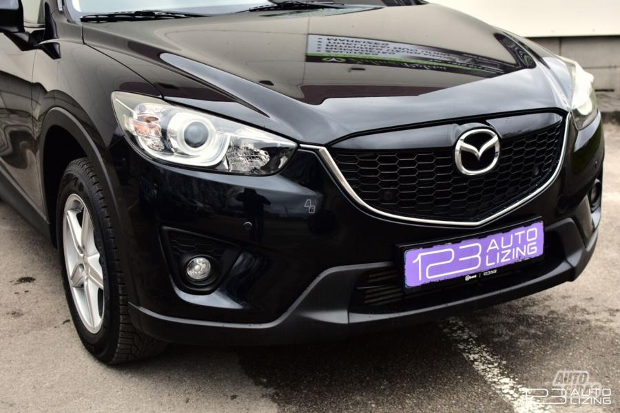 Black Mazda CX-5 2013 in Kretinga, with an engine capacity of 2.20 L and mileage of 196 thousand km for 7950 €, photo 7 on AUTOMOTO.COM.LV