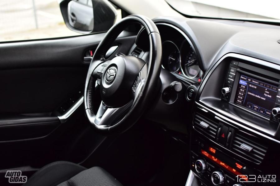 Black Mazda CX-5 2013 in Kretinga, with an engine capacity of 2.20 L and mileage of 196 thousand km for 7950 €, photo 28 on AUTOMOTO.COM.LV