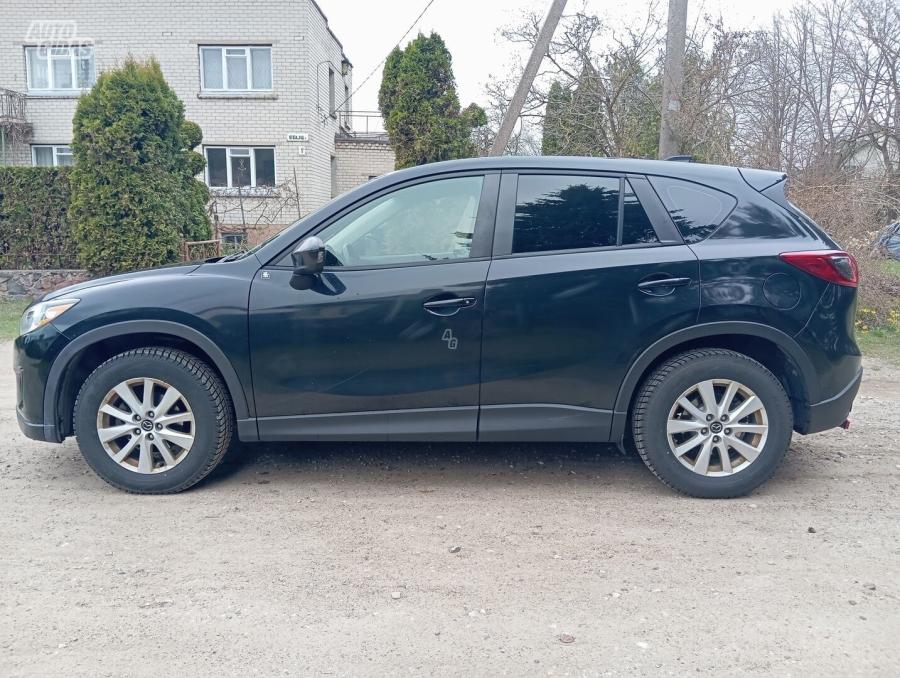 Black Mazda CX-5 2013 in Ukmerge, with an engine capacity of 2.00 L and mileage of 340 thousand km for 6700 €, photo 9 on AUTOMOTO.COM.LV