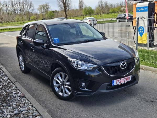 Black Mazda CX-5 2013 in Kluonaliai, with an engine capacity of 2.20 L and mileage of 221 thousand km for 6999 €, photo 3 on AUTOMOTO.COM.LV