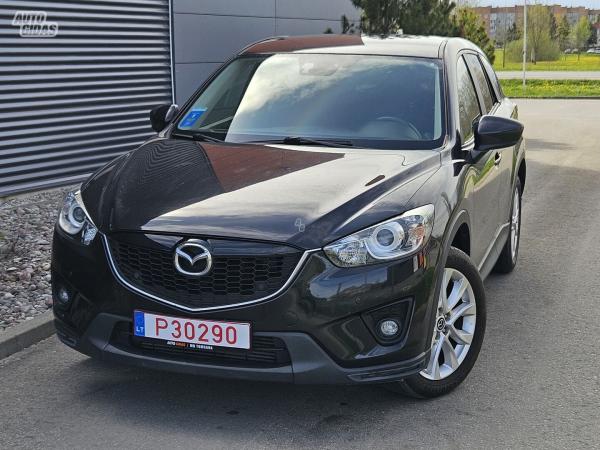Black Mazda CX-5 2013 in Kluonaliai, with an engine capacity of 2.20 L and mileage of 221 thousand km for 6999 €, photo 7 on AUTOMOTO.COM.LV
