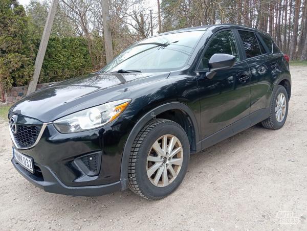 Black Mazda CX-5 2013 in Ukmerge, with an engine capacity of 2.00 L and mileage of 212 thousand km for 6200 €, photo 2 on AUTOMOTO.COM.LV