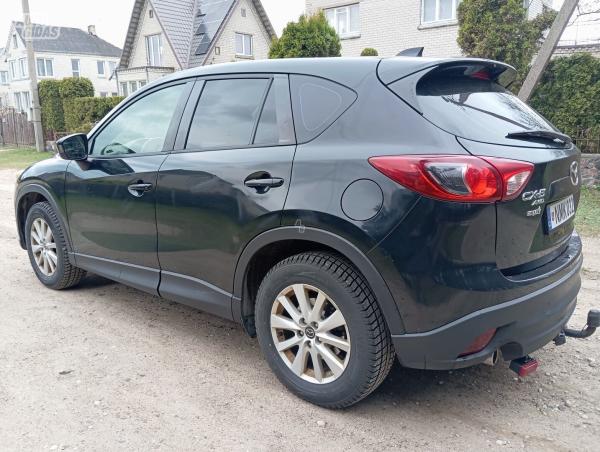 Black Mazda CX-5 2013 in Ukmerge, with an engine capacity of 2.00 L and mileage of 212 thousand km for 6200 €, photo 4 on AUTOMOTO.COM.LV