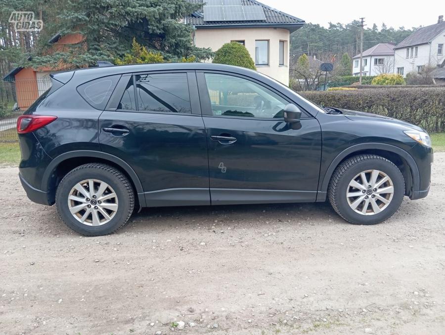 Melns Mazda CX-5 2013 Ukmergė, ar dzinēja tilpumu 2.00 L un nobraukumu 212 tūkst. km par 6200 €, foto 8 vietnē AUTOMOTO.COM.LV