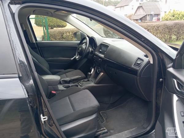 Black Mazda CX-5 2013 in Ukmerge, with an engine capacity of 2.00 L and mileage of 212 thousand km for 6200 €, photo 10 on AUTOMOTO.COM.LV