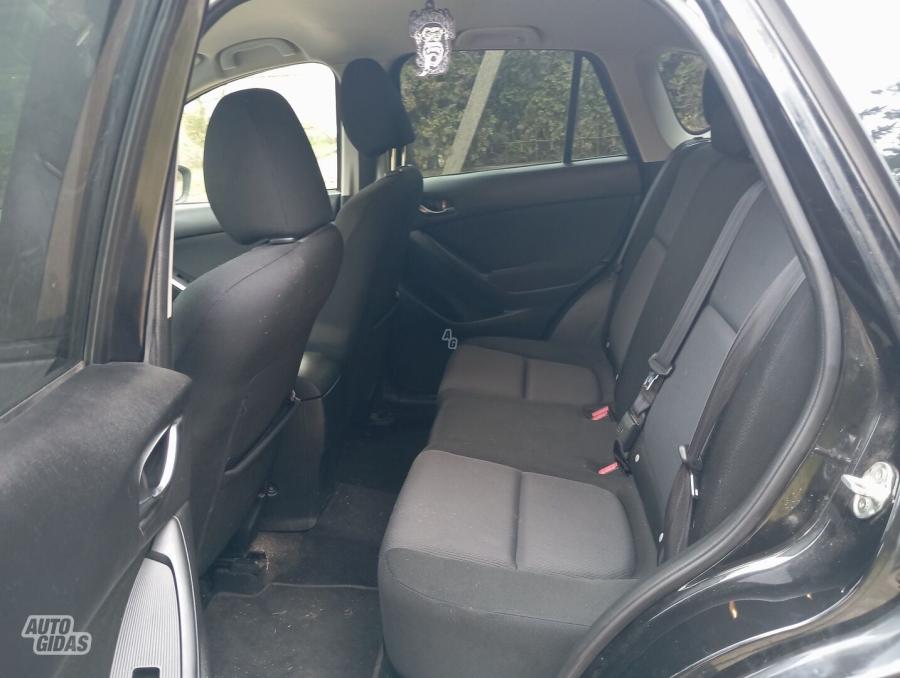 Melns Mazda CX-5 2013 Ukmergė, ar dzinēja tilpumu 2.00 L un nobraukumu 212 tūkst. km par 6200 €, foto 12 vietnē AUTOMOTO.COM.LV