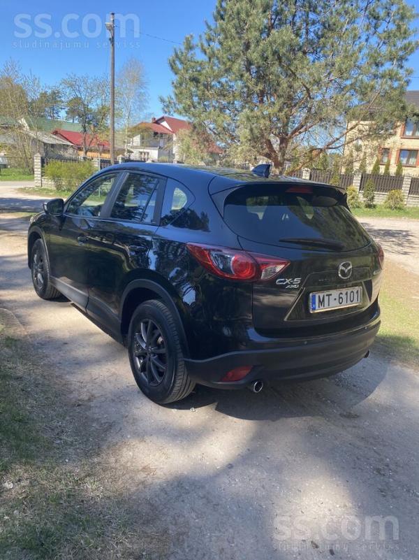 Melns Mazda CX-5 2013 Daugavpils, ar dzinēja tilpumu 2.20 L un nobraukumu 238 tūkst. km par 7200 €, foto 2 vietnē AUTOMOTO.COM.LV