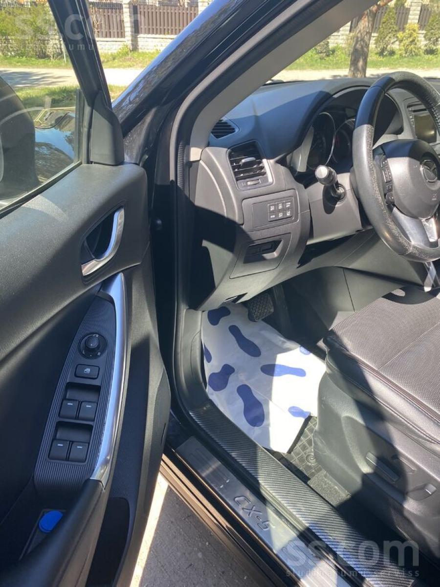 Melns Mazda CX-5 2013 Daugavpils, ar dzinēja tilpumu 2.20 L un nobraukumu 238 tūkst. km par 7200 €, foto 4 vietnē AUTOMOTO.COM.LV
