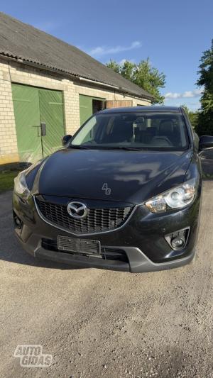 Black Mazda CX-5 2013 in Sakiai, with an engine capacity of 2.20 L and mileage of 103 thousand km for 6600 €, photo  on AUTOMOTO.COM.LV