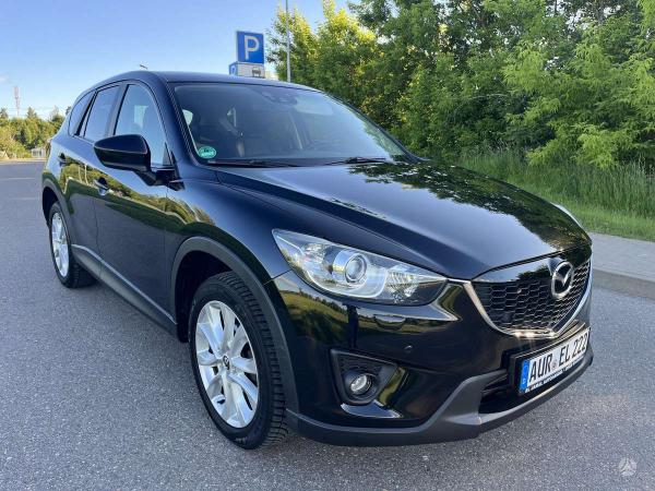 Black Mazda CX-5 2013 in Vilnius, with an engine capacity of 2.20 L and mileage of 234 thousand km for 7750 €, photo 1 on AUTOMOTO.COM.LV