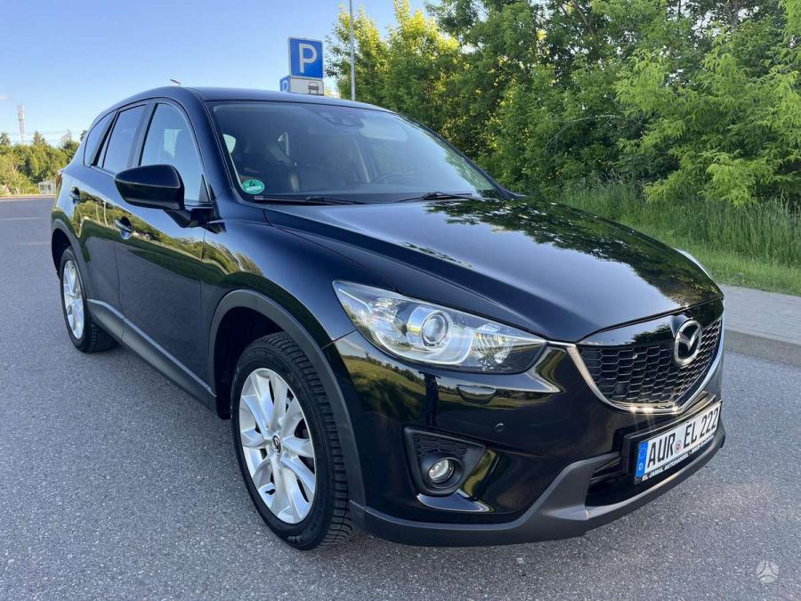 Black Mazda CX-5 2013 in Vilnius, with an engine capacity of 2.20 L and mileage of 234 thousand km for 7750 €, photo 1 on AUTOMOTO.COM.LV