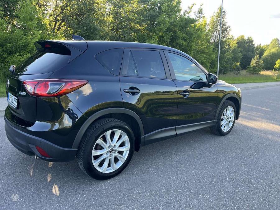 Black Mazda CX-5 2013 in Vilnius, with an engine capacity of 2.20 L and mileage of 234 thousand km for 7750 €, photo 3 on AUTOMOTO.COM.LV