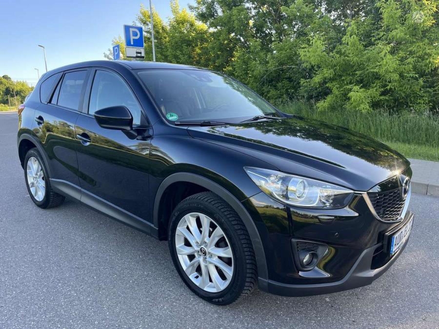 Black Mazda CX-5 2013 in Vilnius, with an engine capacity of 2.20 L and mileage of 234 thousand km for 7750 €, photo 6 on AUTOMOTO.COM.LV