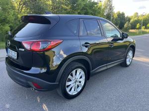 Black Mazda CX-5 2013 in Vilnius, with an engine capacity of 2.20 L and mileage of 234 thousand km for 7750 €, photo 7 on AUTOMOTO.COM.LV