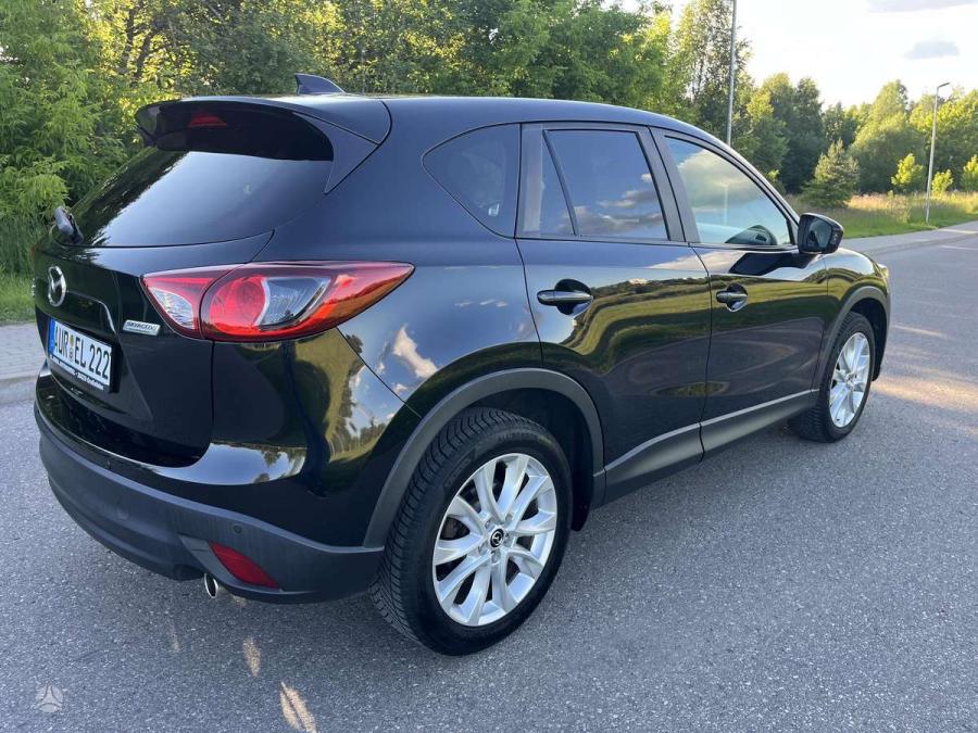 Black Mazda CX-5 2013 in Vilnius, with an engine capacity of 2.20 L and mileage of 234 thousand km for 7750 €, photo 7 on AUTOMOTO.COM.LV