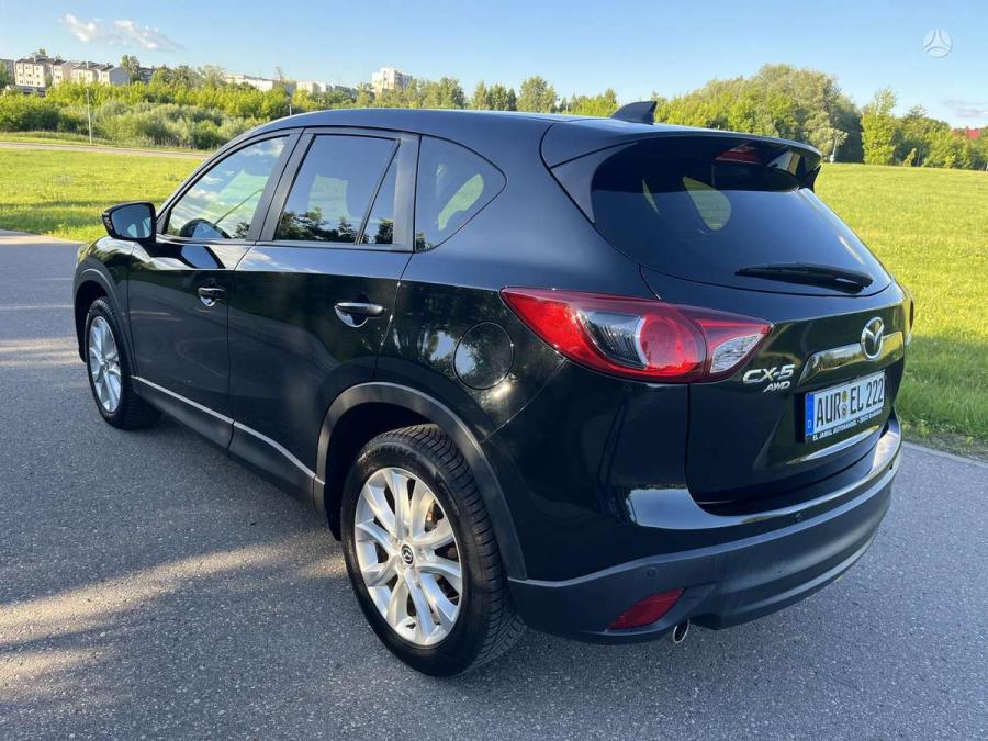 Black Mazda CX-5 2013 in Vilnius, with an engine capacity of 2.20 L and mileage of 234 thousand km for 7750 €, photo 8 on AUTOMOTO.COM.LV