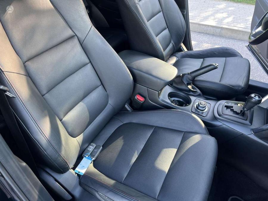 Black Mazda CX-5 2013 in Vilnius, with an engine capacity of 2.20 L and mileage of 234 thousand km for 7750 €, photo 21 on AUTOMOTO.COM.LV