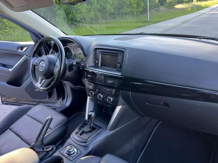 Black Mazda CX-5 2013 in Vilnius, with an engine capacity of 2.20 L and mileage of 234 thousand km for 7750 €, photo 22 on AUTOMOTO.COM.LV