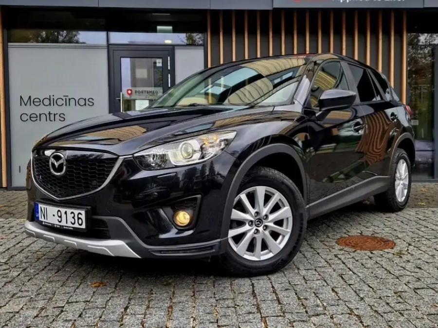 Black Mazda CX-5 2013 in Riga, with an engine capacity of 2.20 L and mileage of 187 thousand km for 11690 €, photo 1 on AUTOMOTO.COM.LV